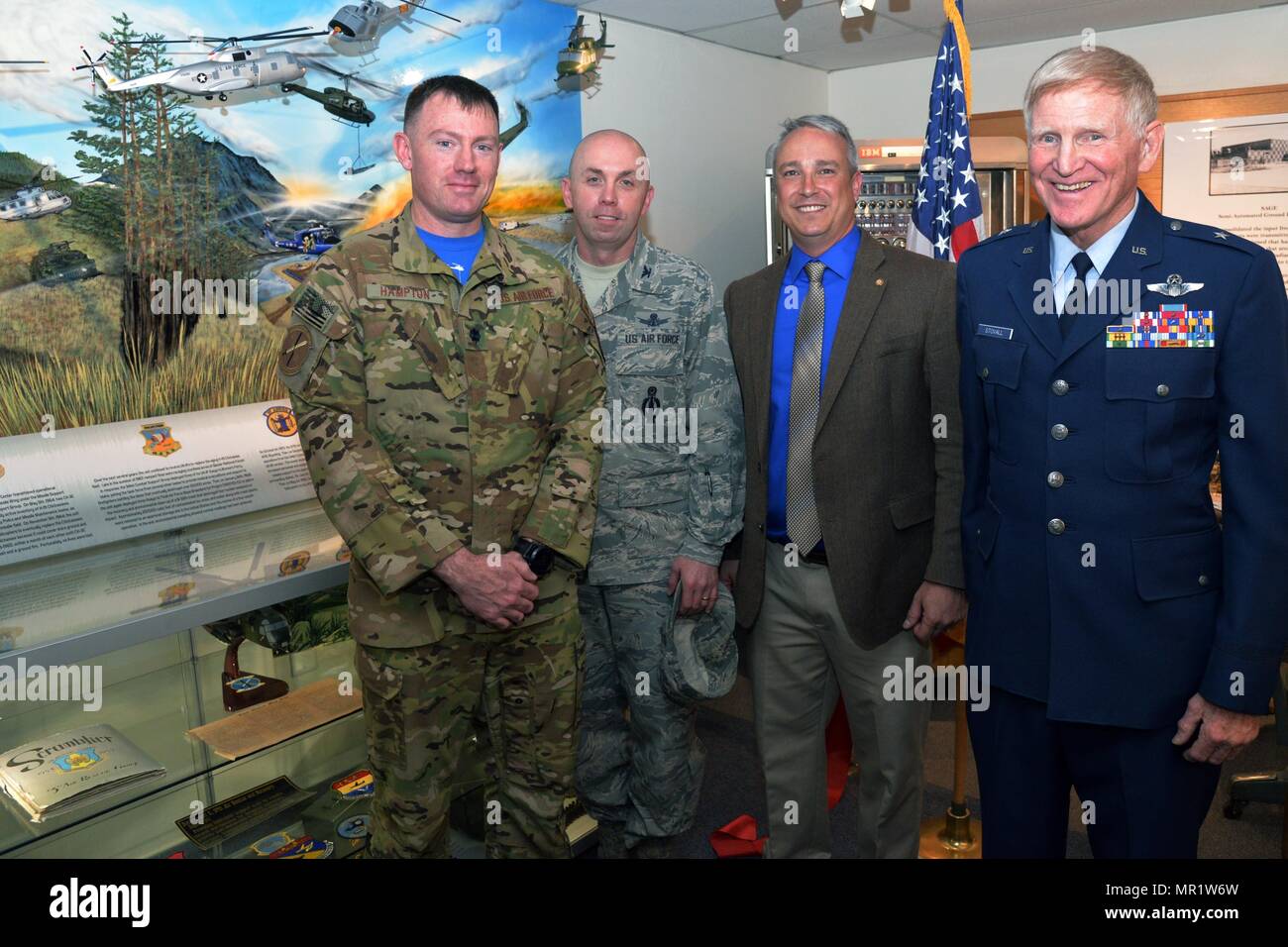 Lt. Col. Joshua Hampton, 40th Helicopter Squadron commander, left, Col ...
