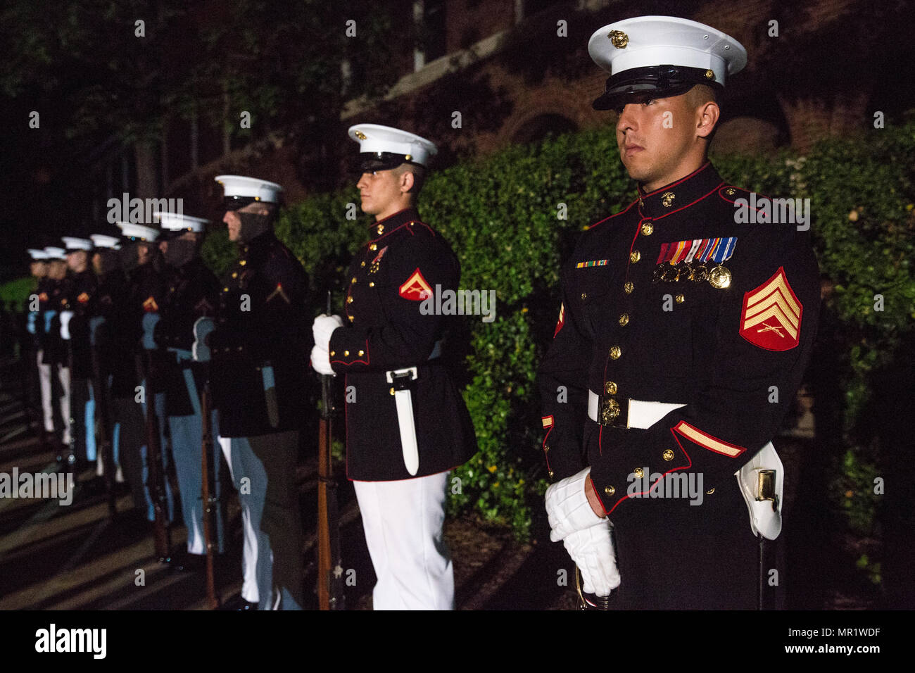 U.S. Marines with Alpha Company, Marine Barracks Washington, stand at ...