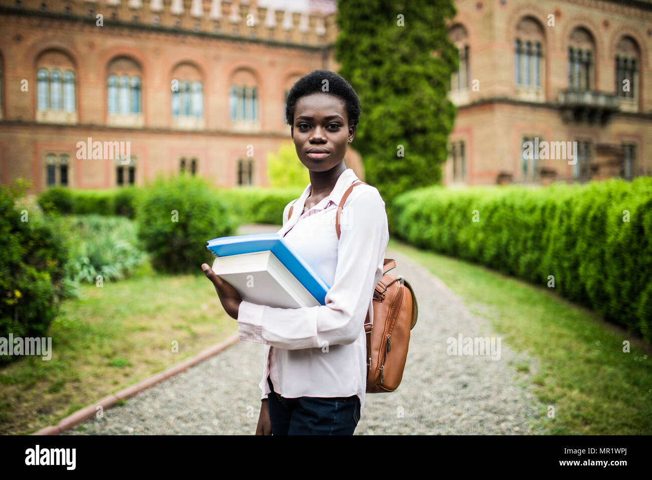 attractive african American female college student on campus Stock ...