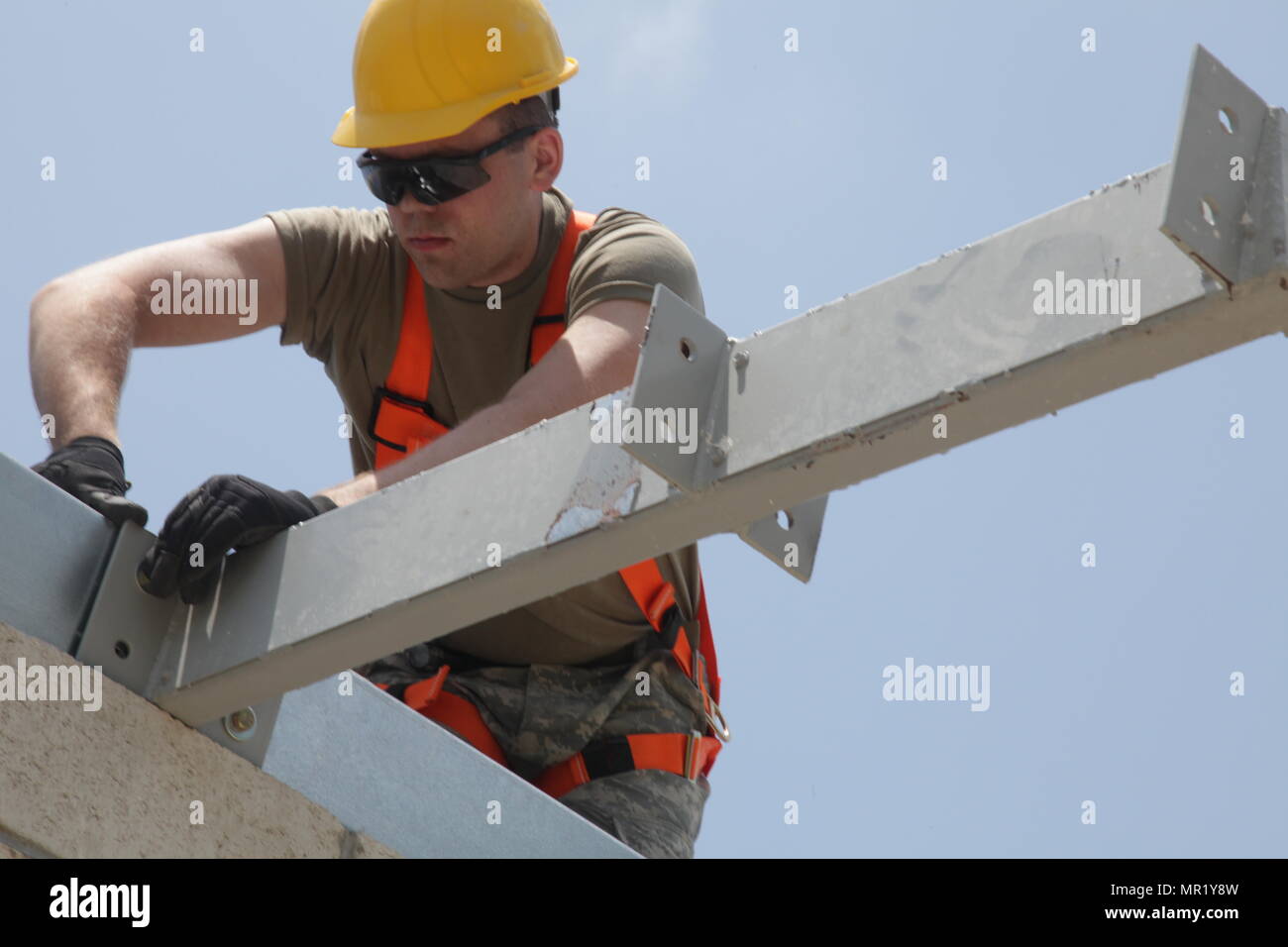 U.S. Army Pfc. Andrew Walter, with the 372nd Engineer Company, places a ...