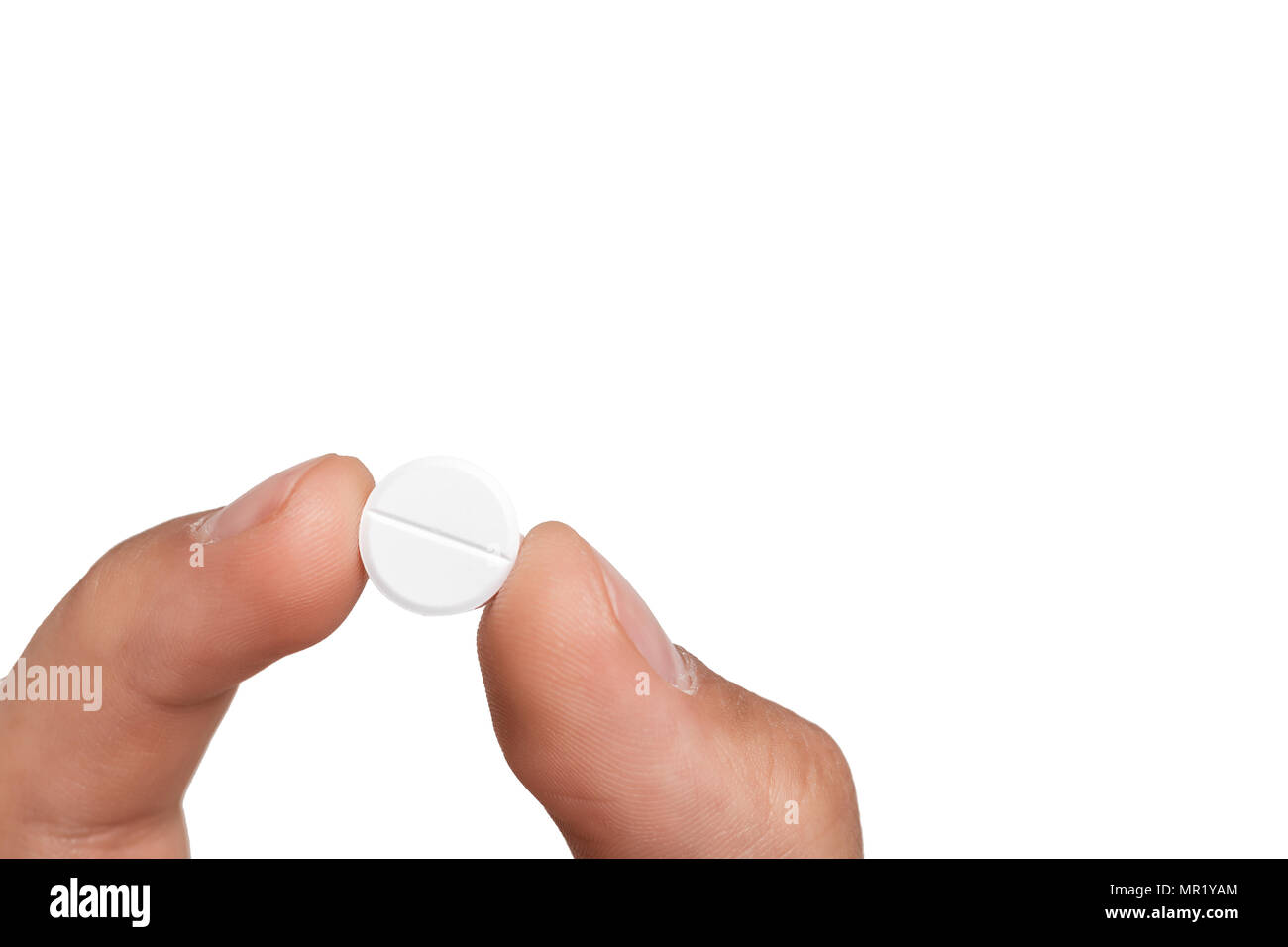 pill in man's hand on white background Stock Photo - Alamy