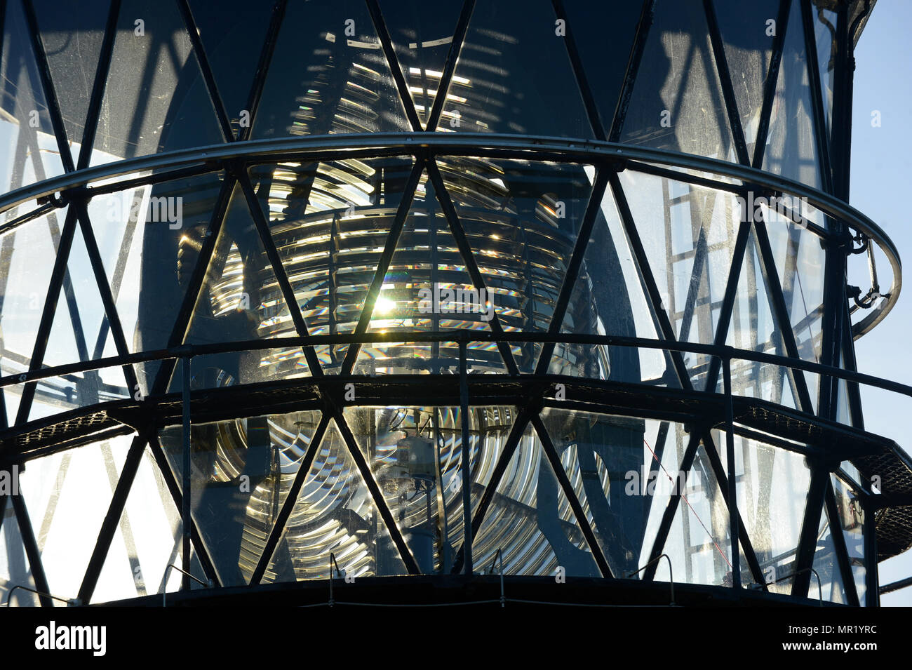 Lighthouse lens in the daytime with the sun shining though it at ...