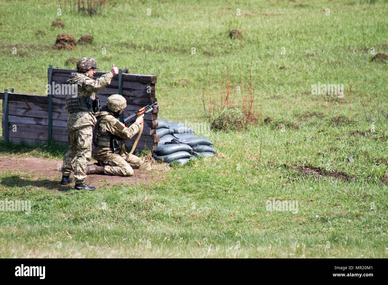 A Yavoriv Combat Training Center trainer gives a thumbs up, signaling ...