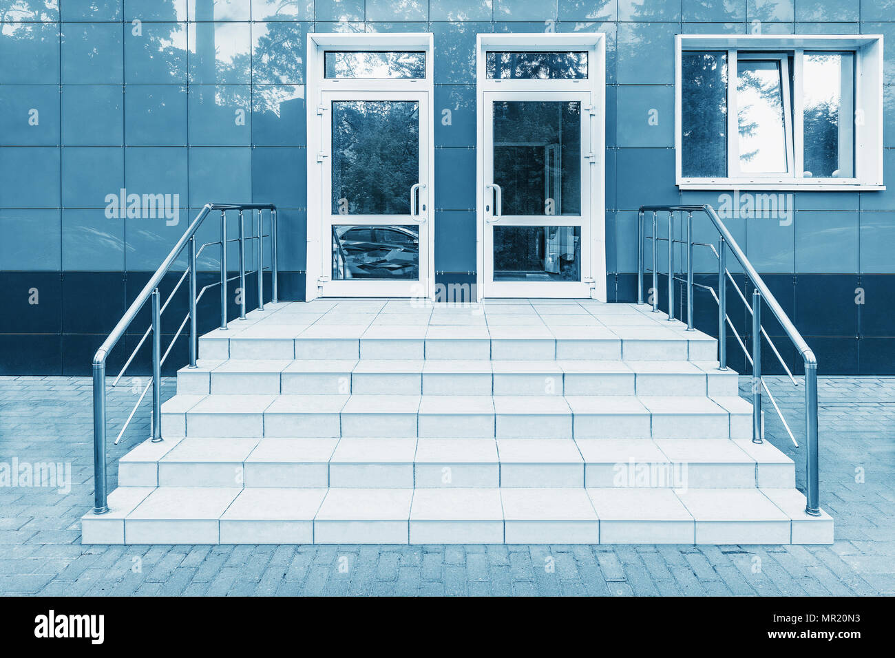 Entrance of the modern business city office building Stock Photo - Alamy