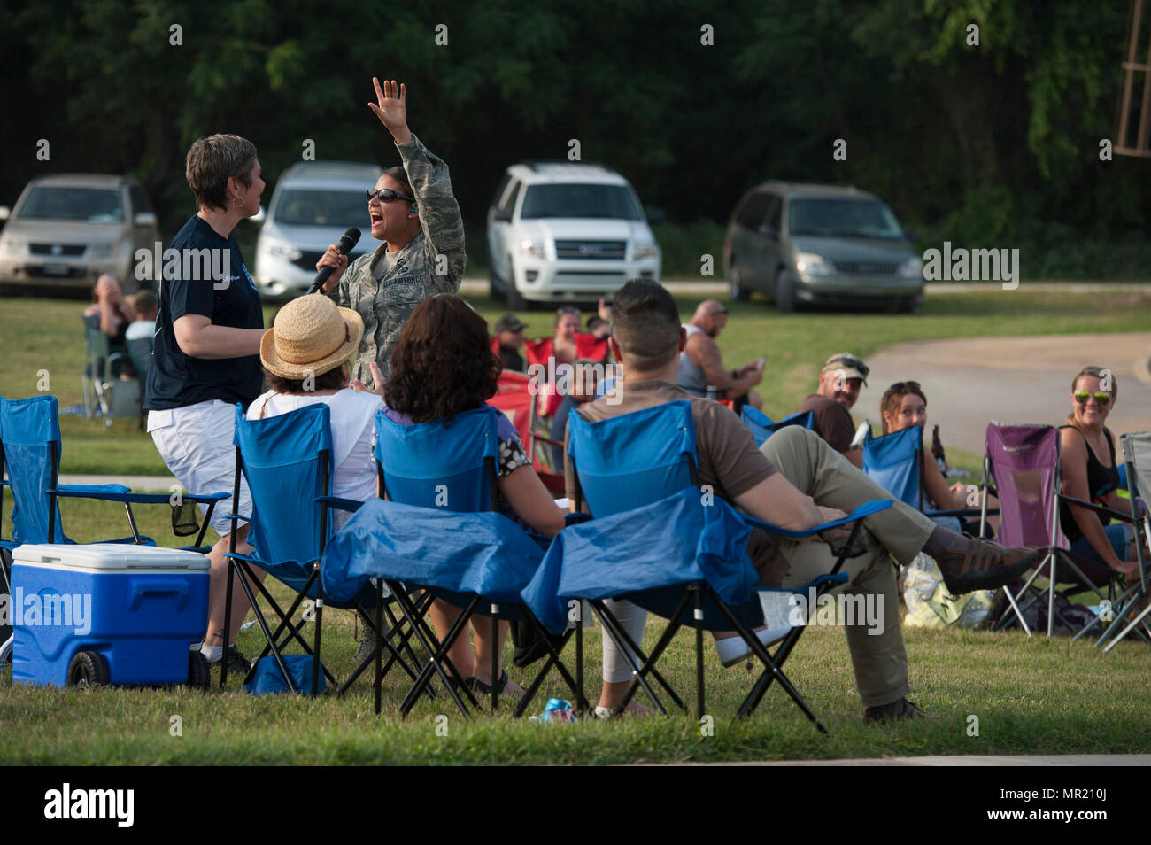 Technical Sgt. Nalani Quintello, vocalist, sings and dances with a ...