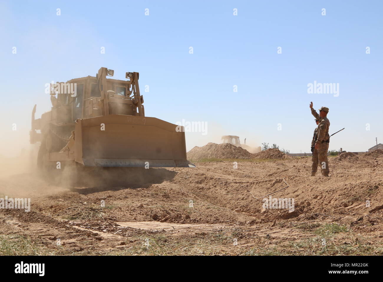 U.S. Army Sgt. Frederick Mickle, a horizontal construction engineer ...