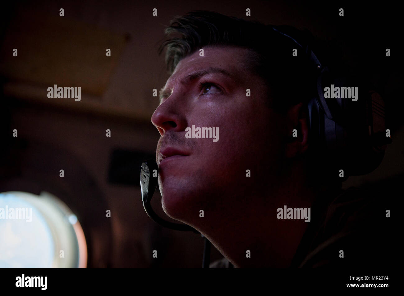 U.S. Naval Aircrewman (Operator) 3rd Class Ryan Wheaton, assigned to ...
