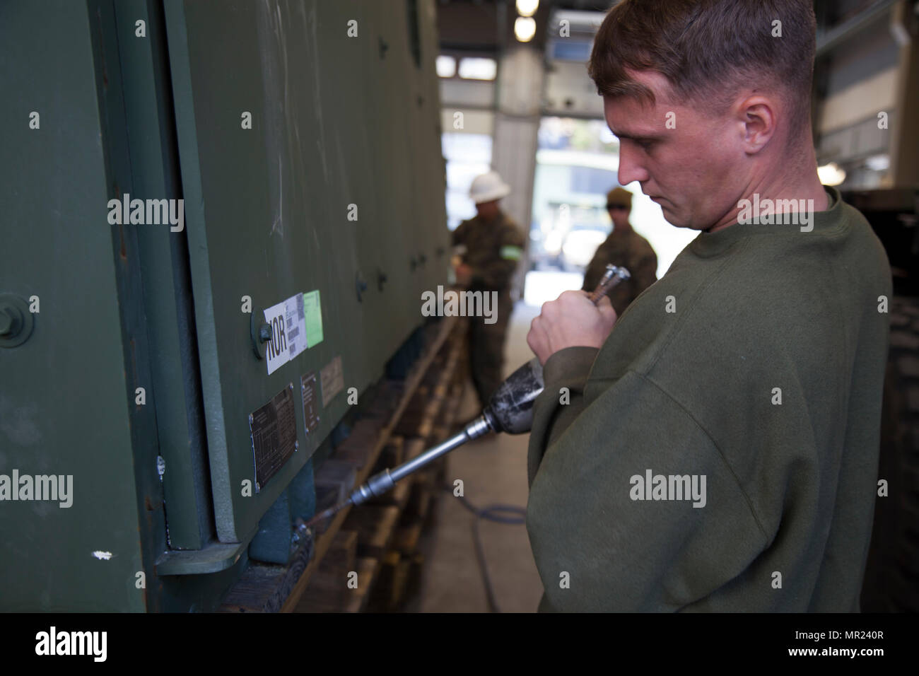 U.S. Marine Corps Cpl. Gordon Budd, a Motor Transport Mechanic with 2nd ...