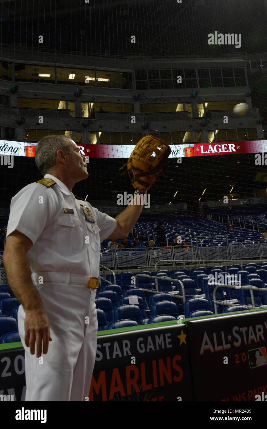 MIAMI, Fla. -- Rear Admiral Roy I. Kitchener warms up prior to the ...