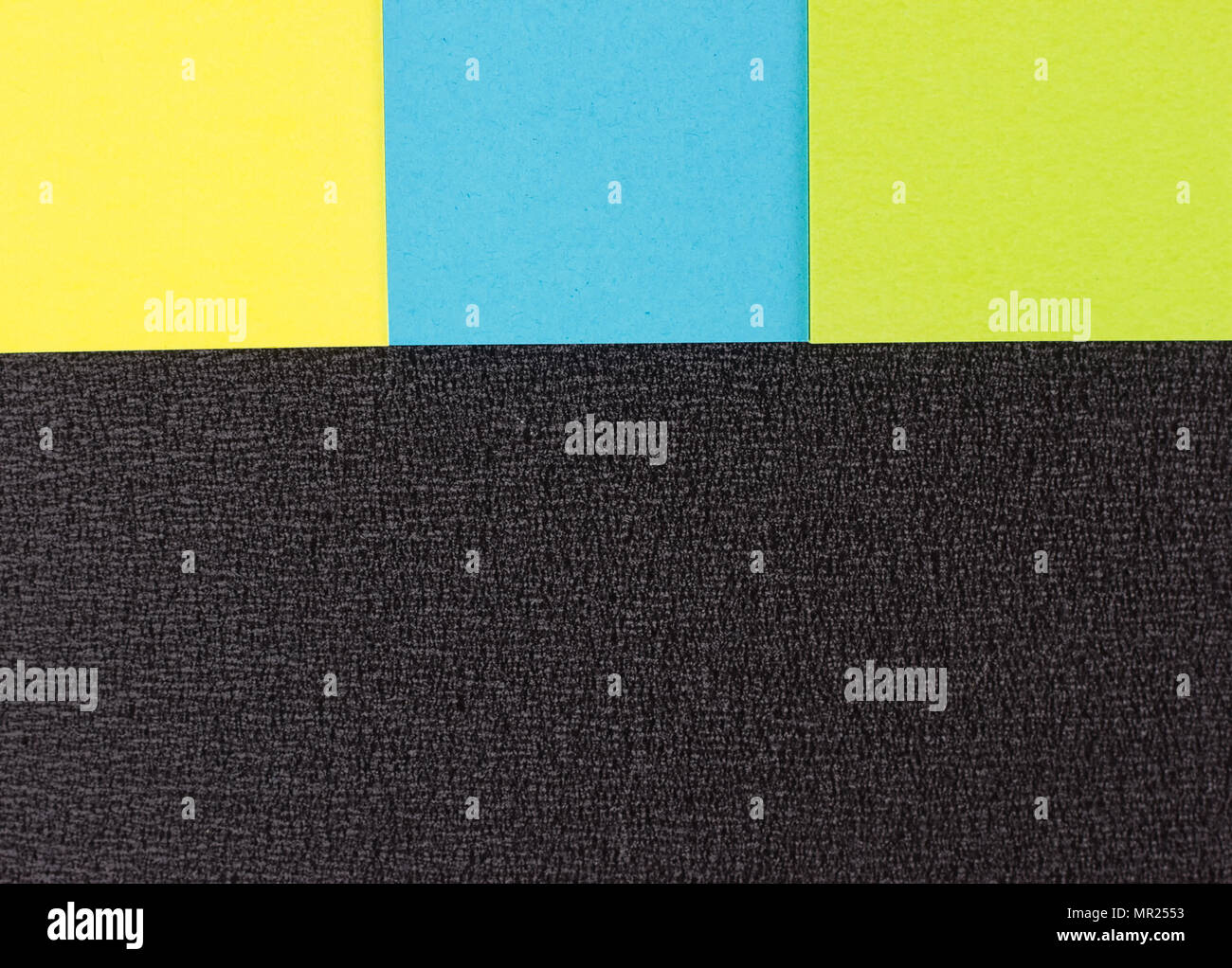 background of colored stickers on the black Stock Photo - Alamy