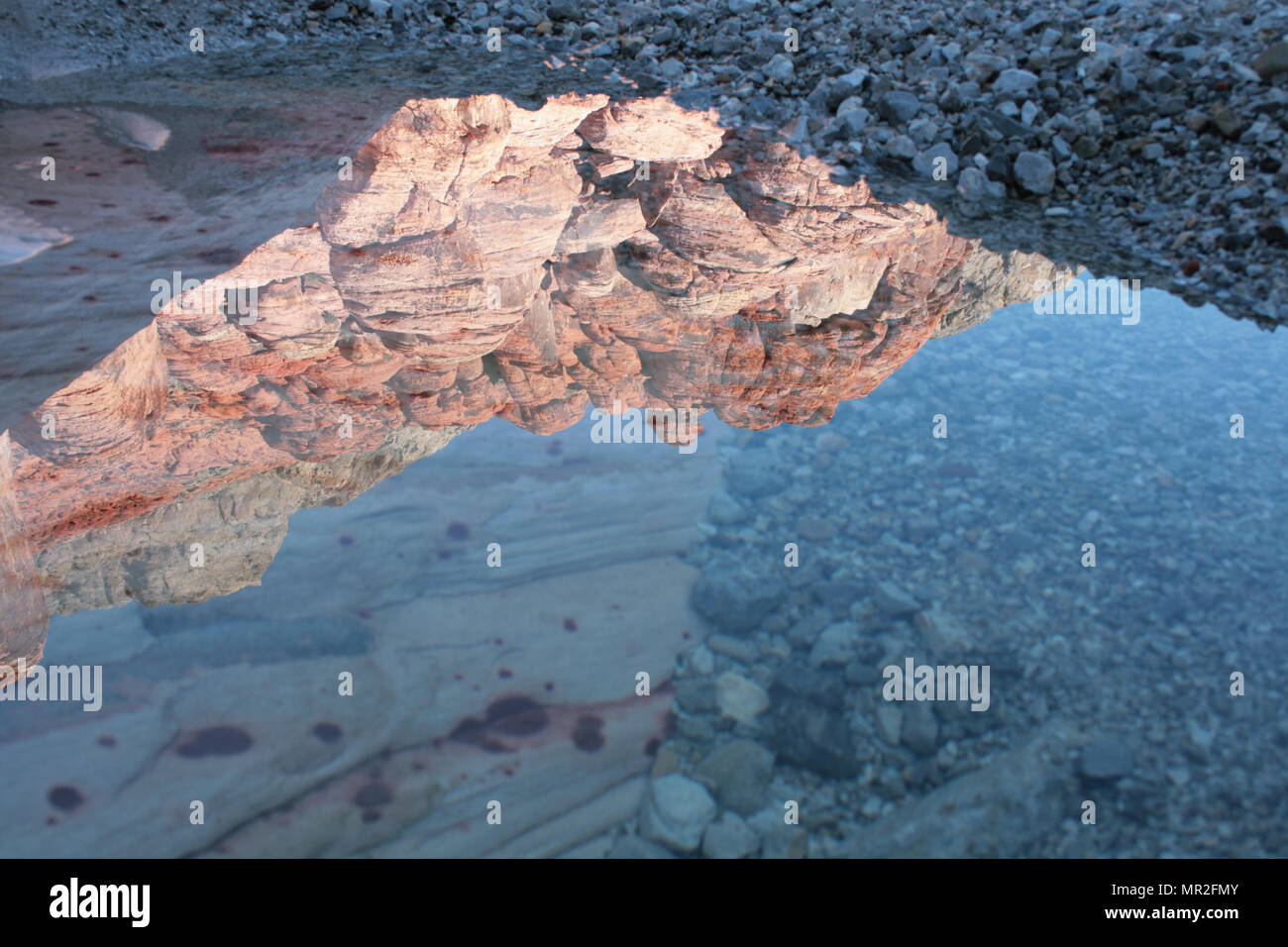 reflection of red rocks in a canyon pool Stock Photo - Alamy