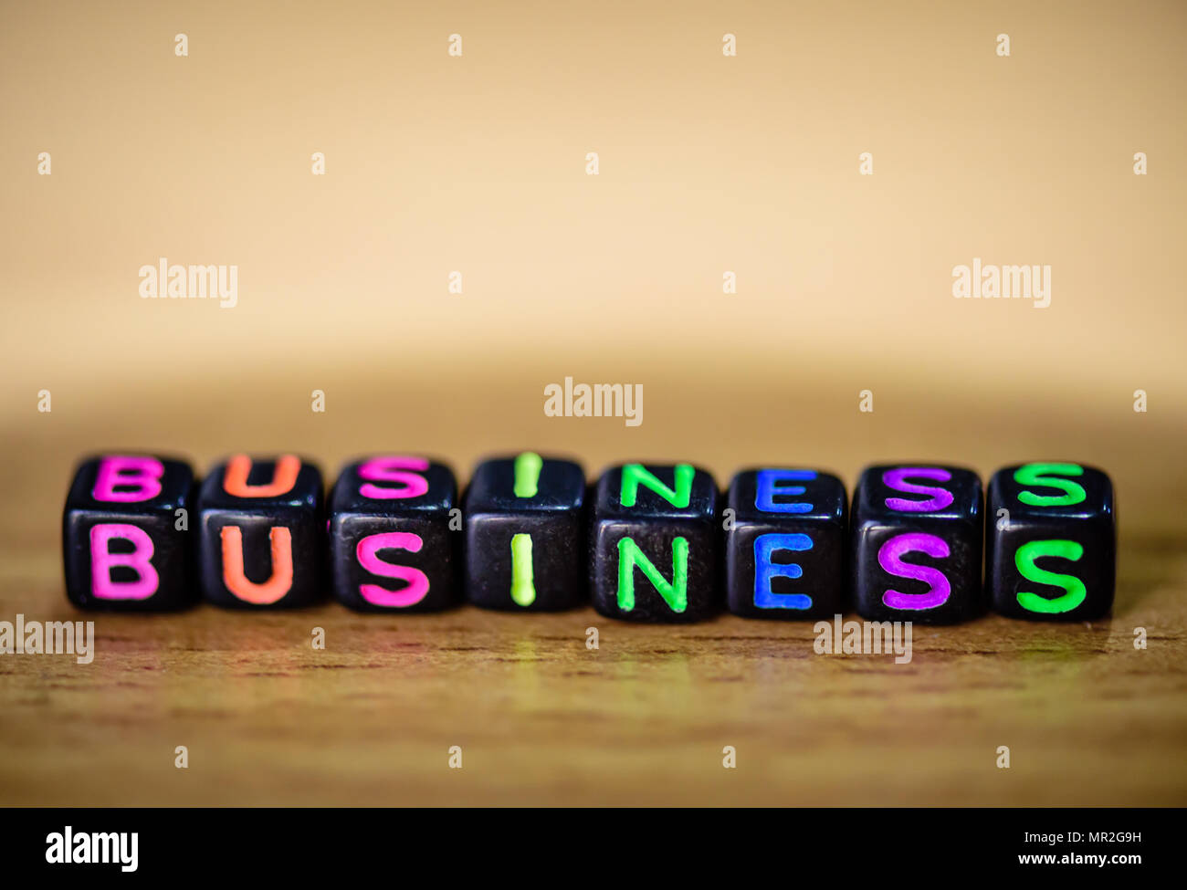 Business alphabet words concept on table background Stock Photo - Alamy