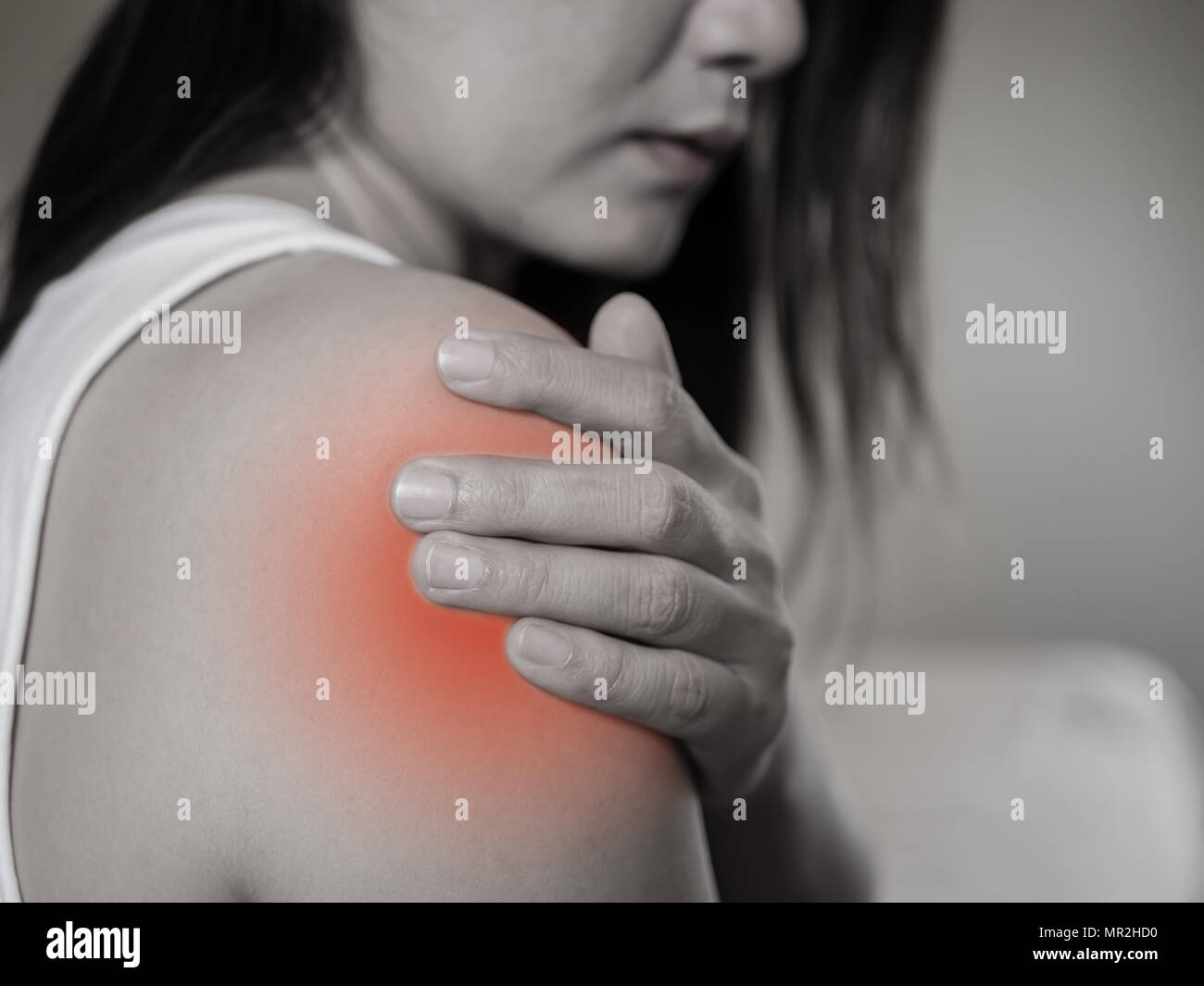 Closeup female's shoulder pain and injury. Health care and medical ...