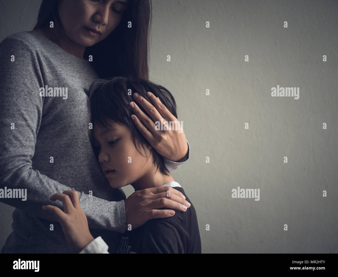 Hugging daughter crying boy hi-res stock photography and images - Alamy