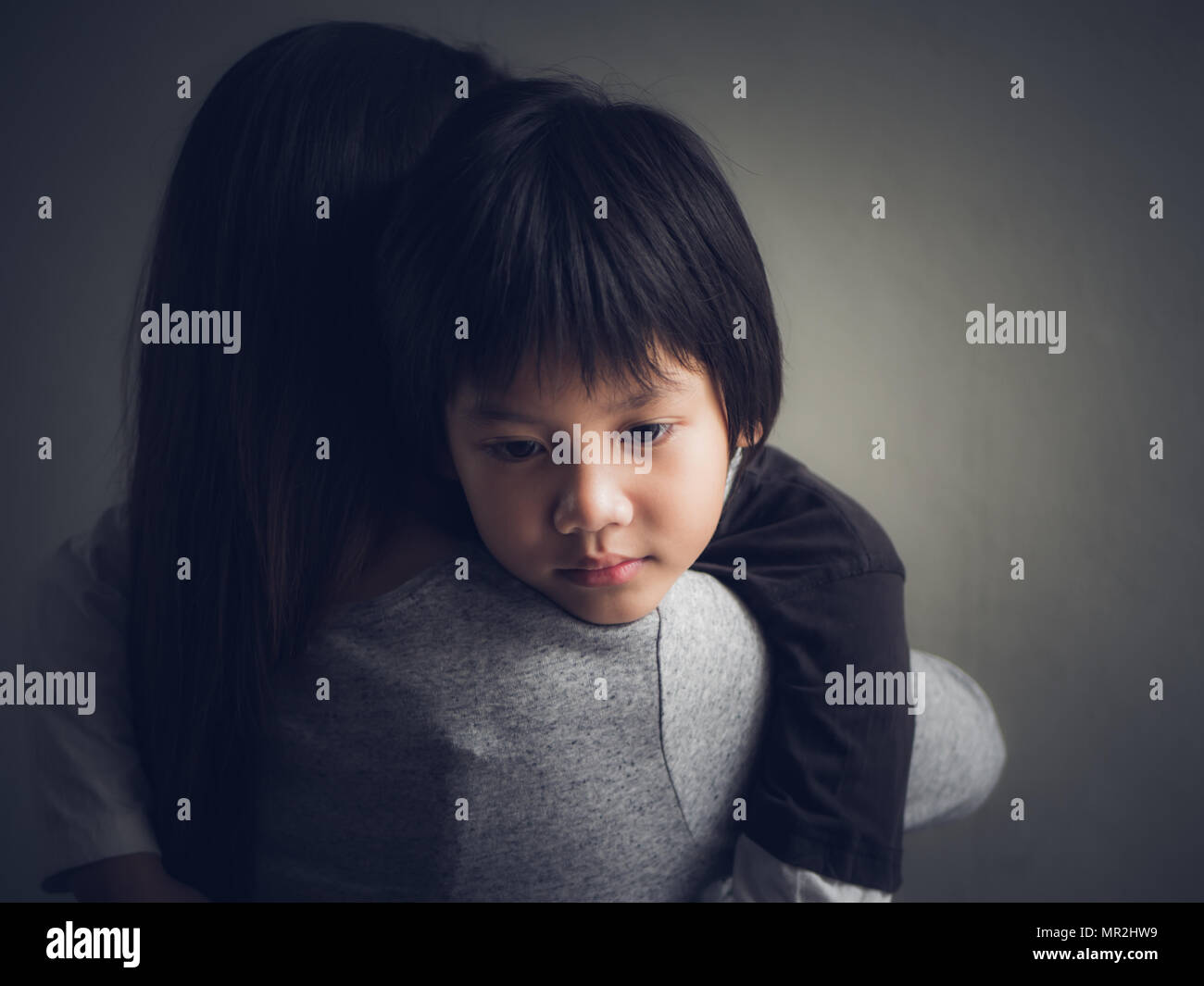 Hugging daughter crying boy hi-res stock photography and images - Alamy