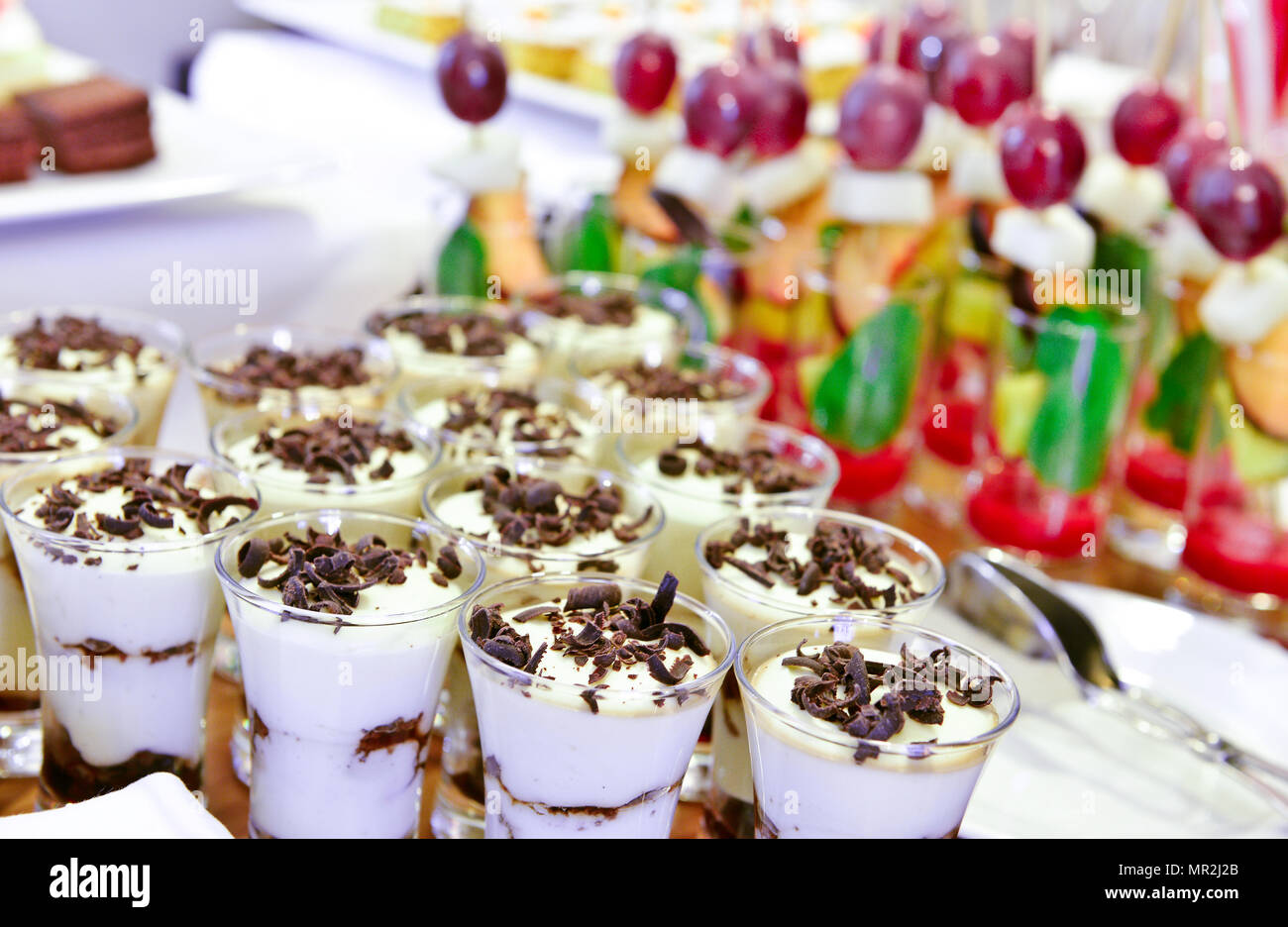 Tiramisu, Panna cotta on the buffet table Stock Photo - Alamy