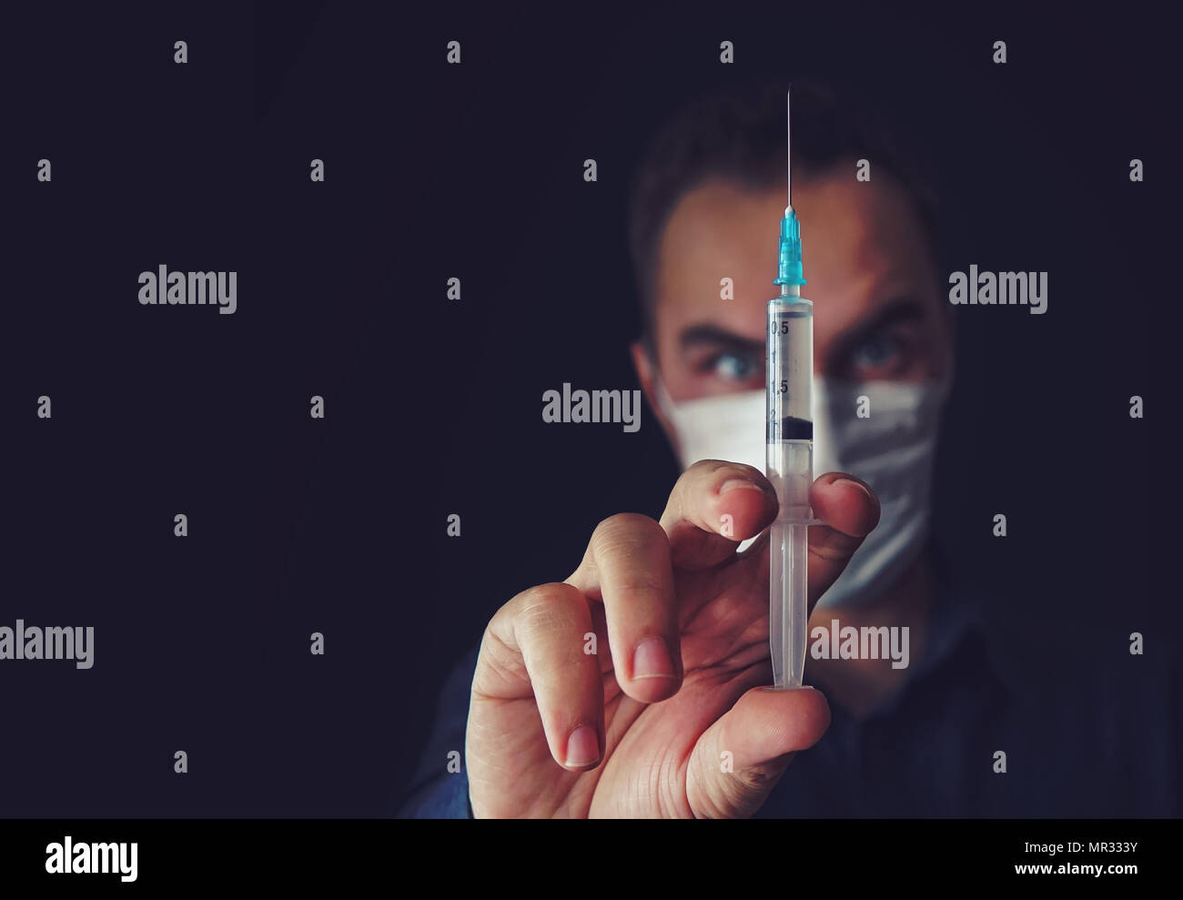 Mad doctor syringe hi-res stock photography and images - Alamy