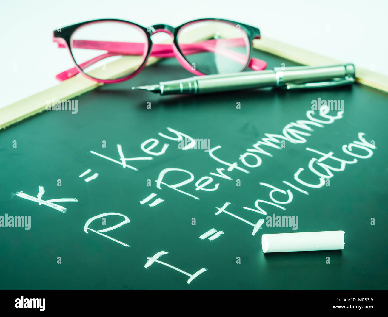 KPI alphabet with the meaning on white table background Stock Photo - Alamy
