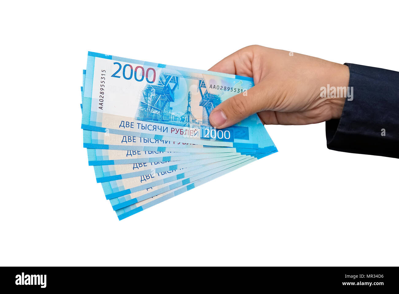 new Russian banknotes denominated in 2000 rubles in male hands close-up ...