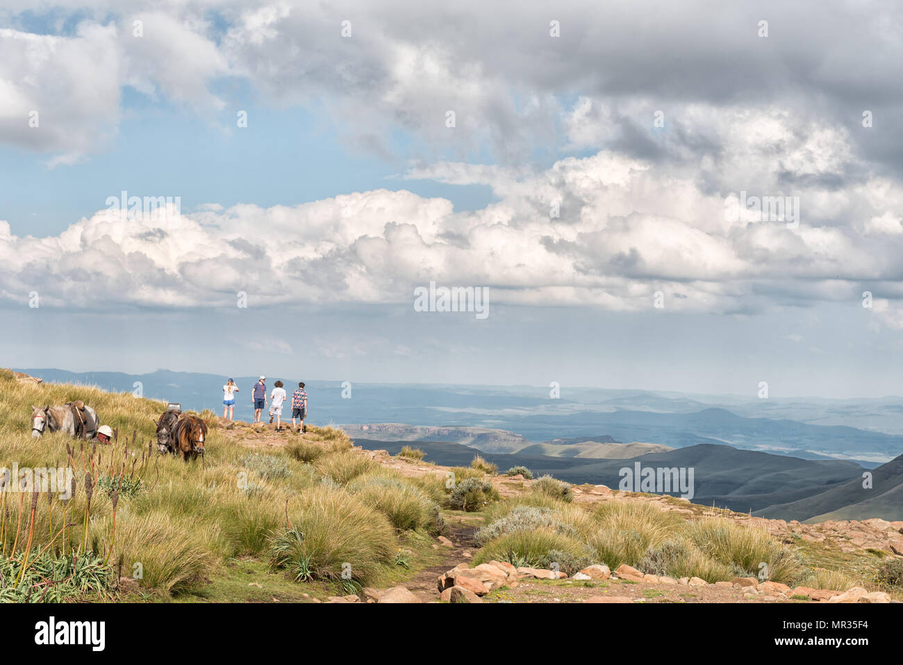 SANI TOP, LESOTHO - MARCH 24, 2018: Unidentified tourists on the edge ...