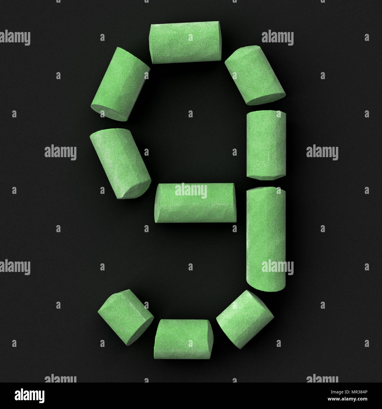 Green sidewalk or blackboard chalks assembled like mathematical digit 9 ...