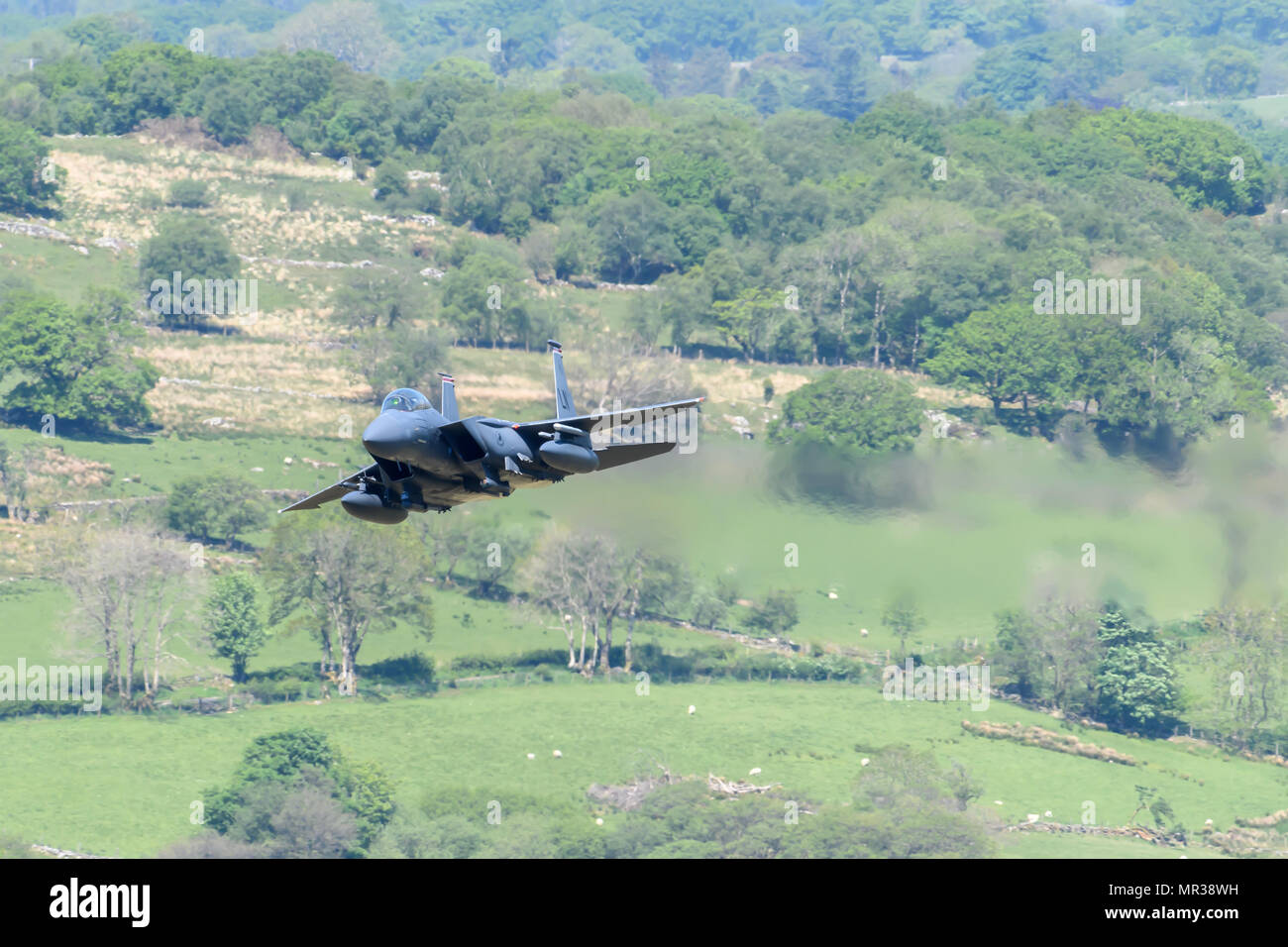 USAF F-15E Strike Eagle flying through the Mack Loop Stock Photo - Alamy