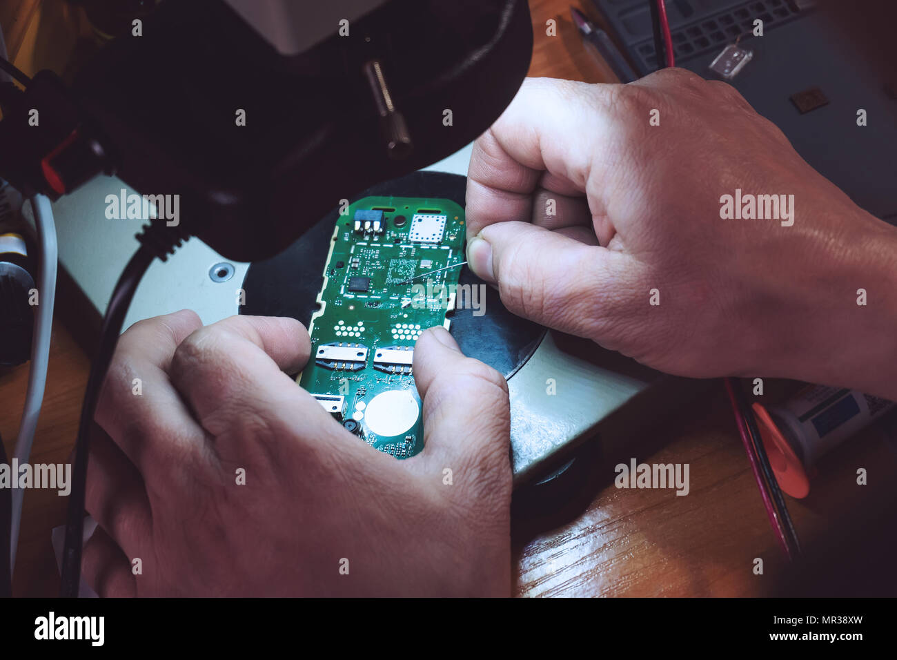 Close-up photos showing process of mobile phone repair. Phone repair ...