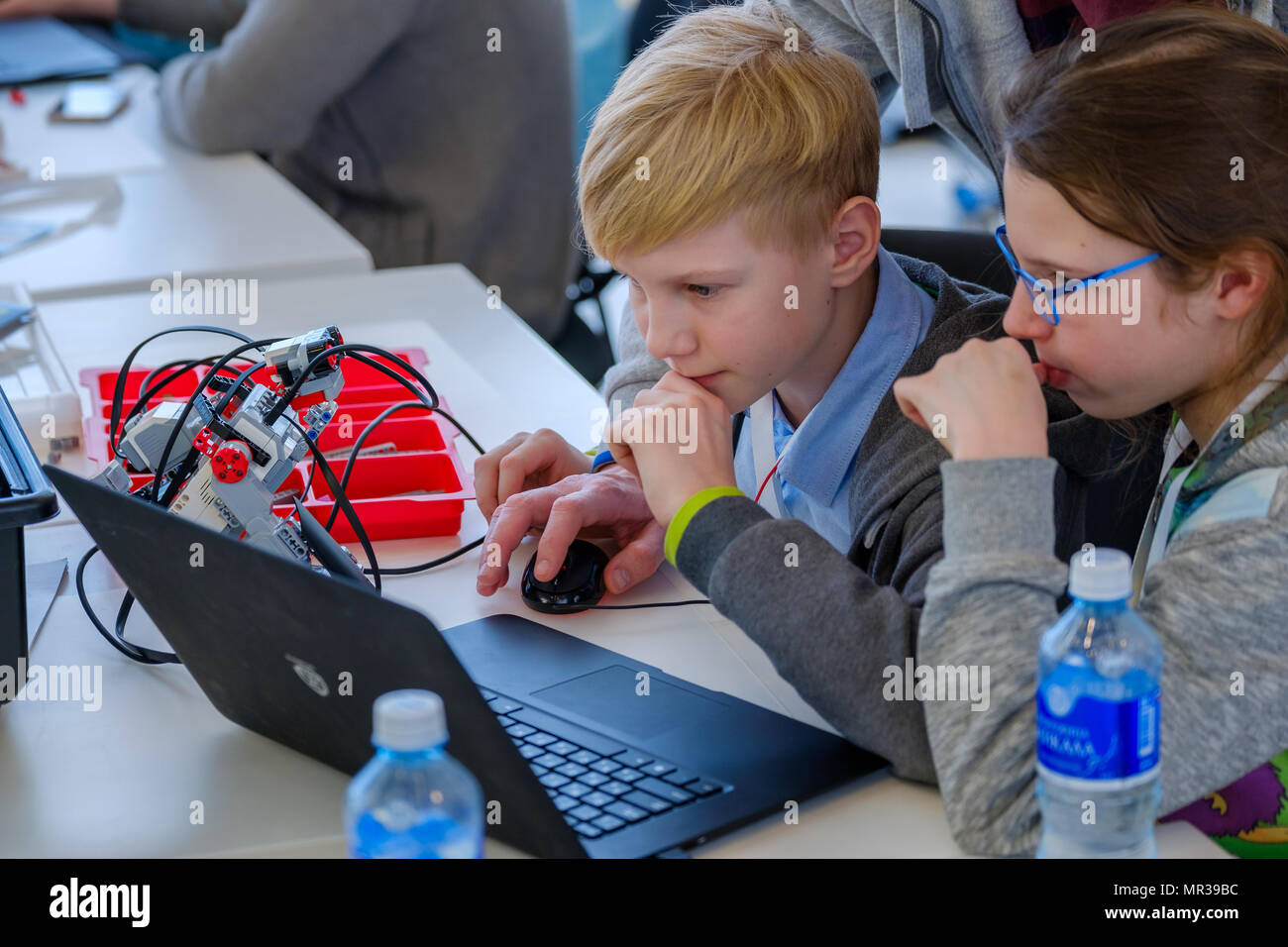 Children learn how to program a robot at Skolkovo Stock Photo - Alamy