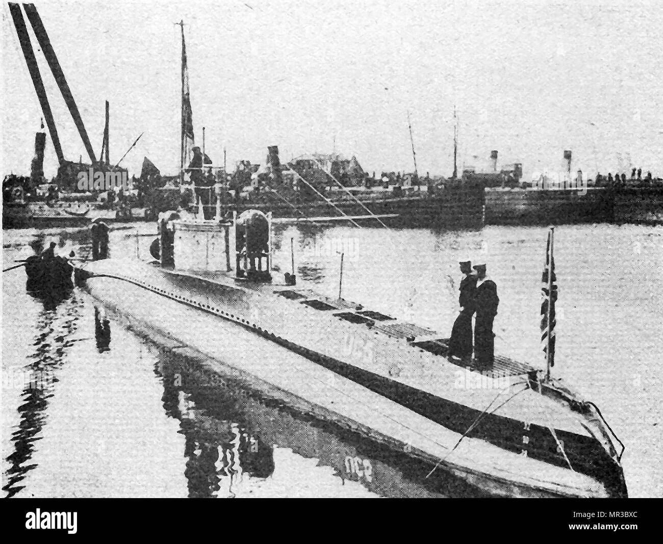 1919 British naval newspaper photograph of the captured German mine ...