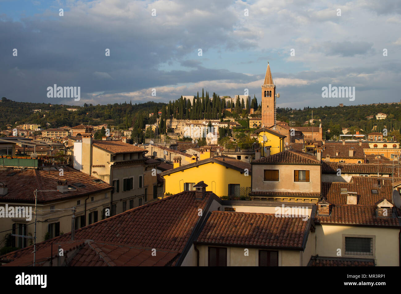 Roof top view over the Italian city of Verona with the spire of the ...