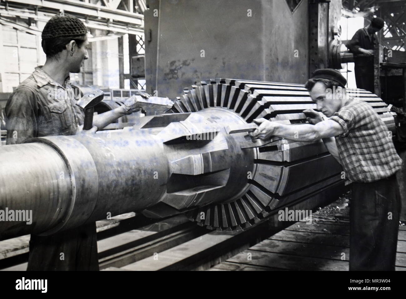 Photograph of an M-5 Turbo Generator being constructed according to ...