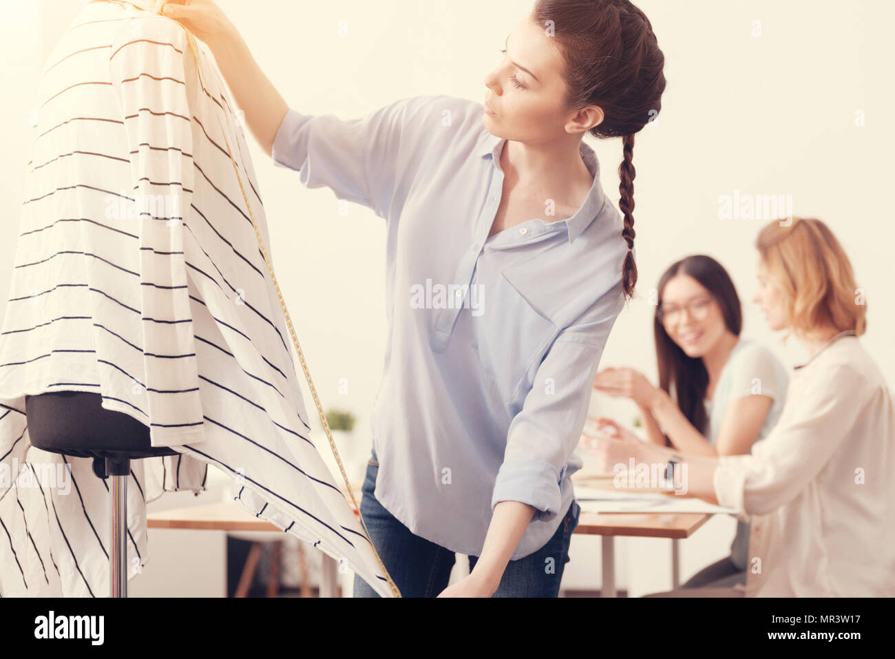 Dressmaker measuring hi-res stock photography and images - Alamy