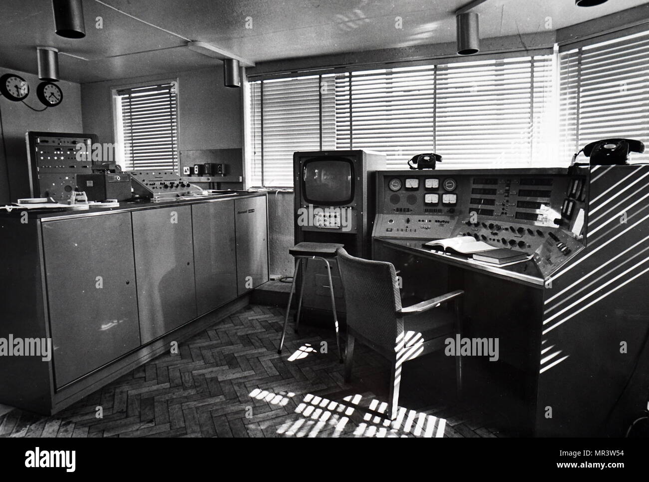 Photograph of a radio telescope control room. A radio telescope is a ...
