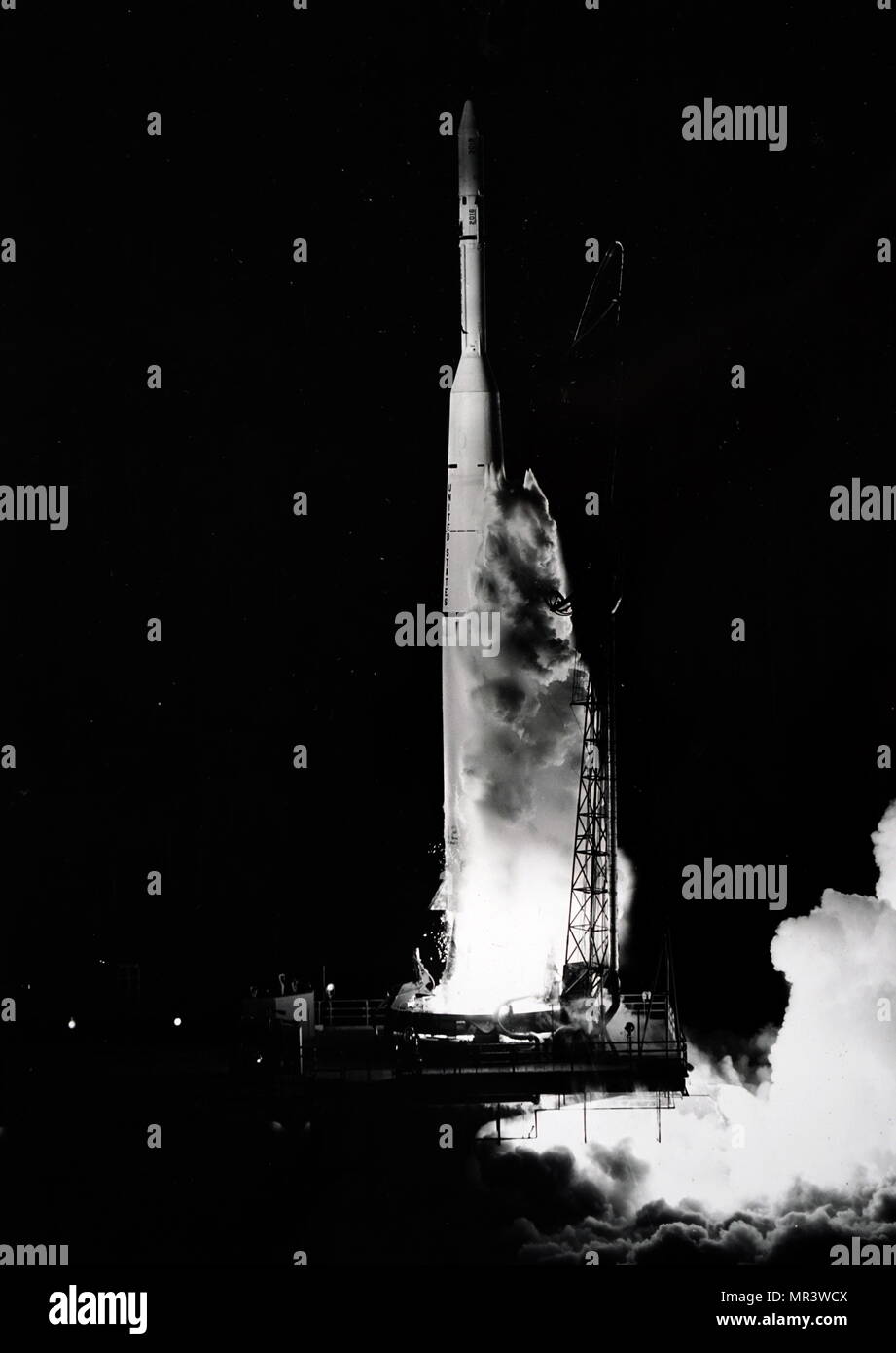 Photograph taken during the launch of a Thor Delta rocket carrying the ...