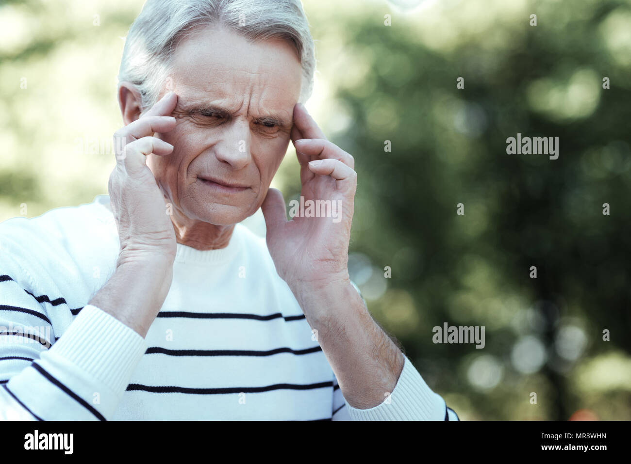 Irritated male trying to remember his name Stock Photo - Alamy