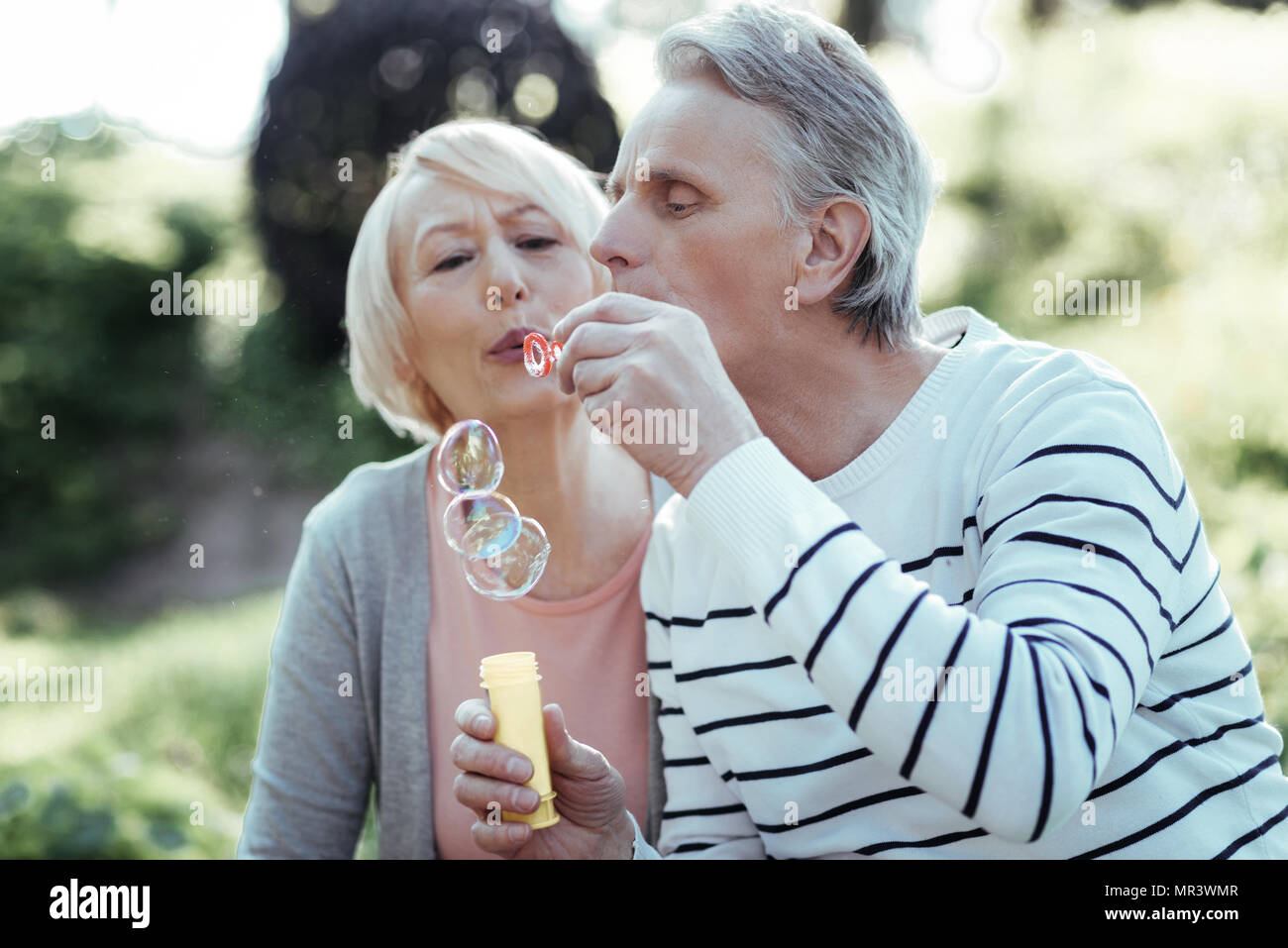 Concentrated people spending time with pleasure Stock Photo - Alamy