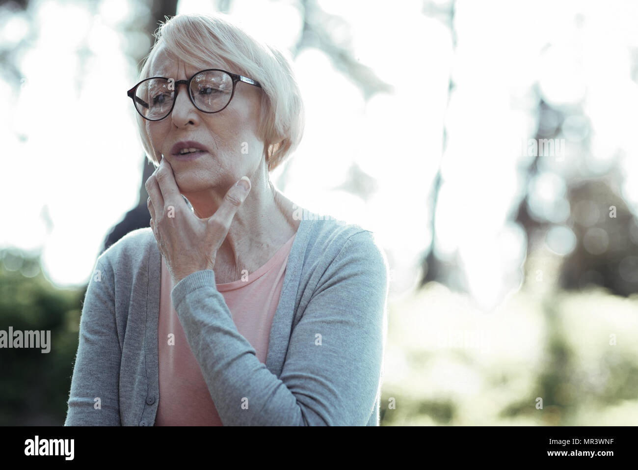 Female expressions outside hi-res stock photography and images - Alamy