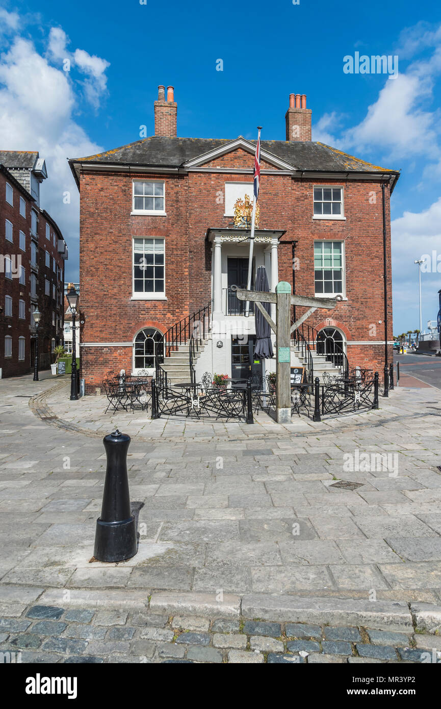 Street scene of Poole's historic heritage at the old Customs House ...