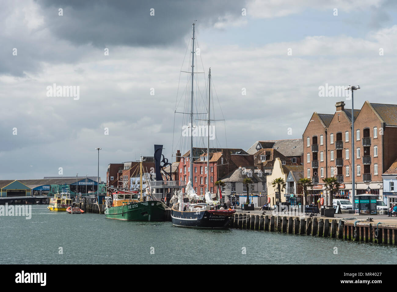 Poole harbour and marina along Poole's sea front promenade and the old ...
