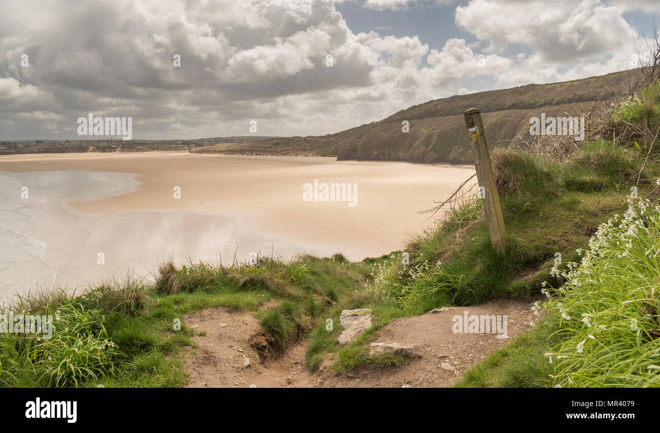 Walking the coast path at Port Kidney beach, Lelant, Cornwall Stock ...
