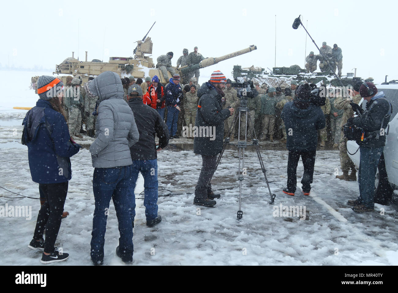 The Denver Broncos broadcasting team sets up for soldiers from the 1st ...