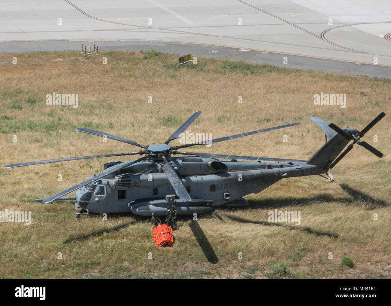 U.S. Marine Corps crew chiefs assigned to Marine Heavy Helicopter (HMH ...