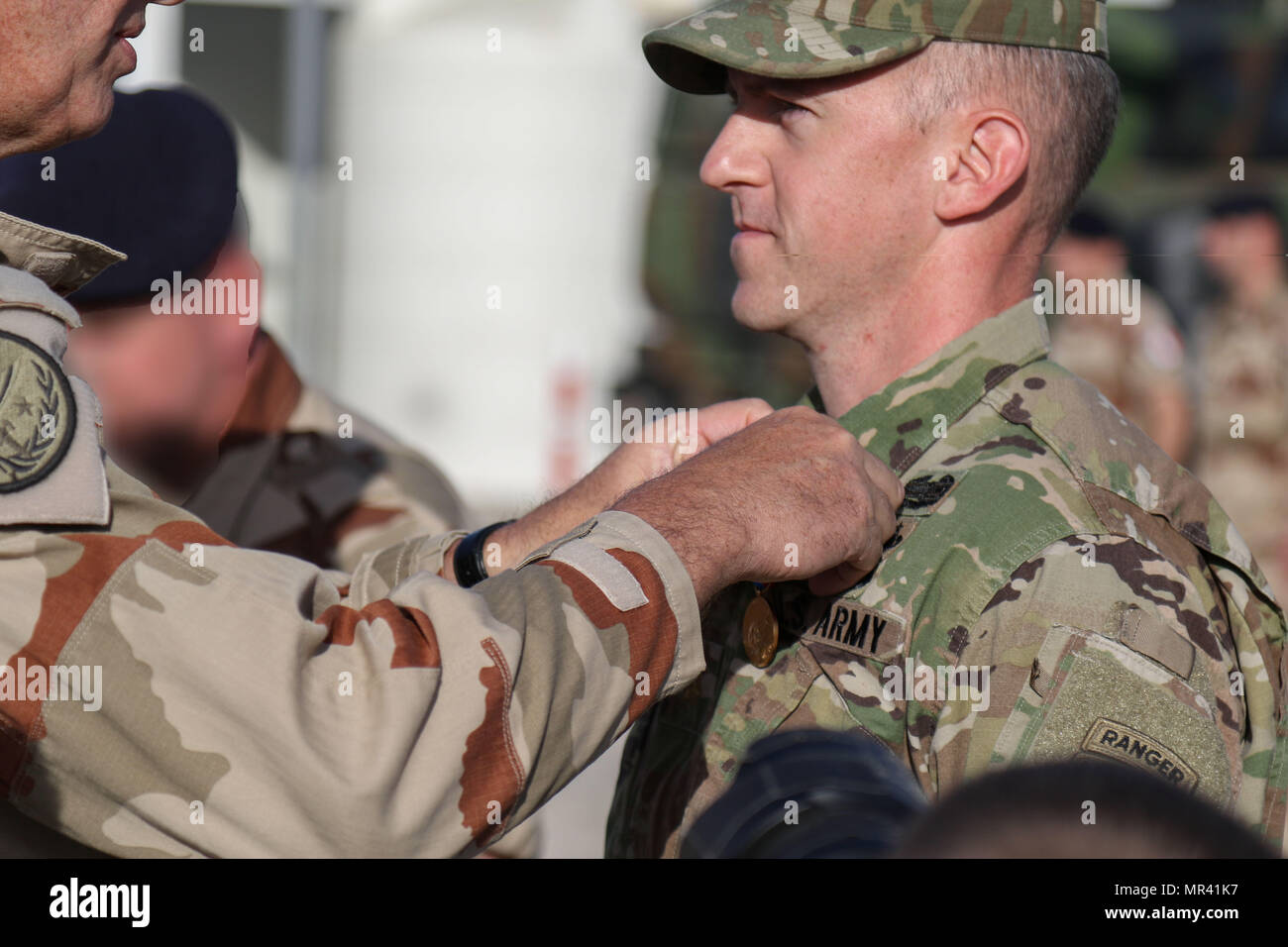 U.S. Army Maj. Christopher Walsh, a Paratrooper deployed in support of ...