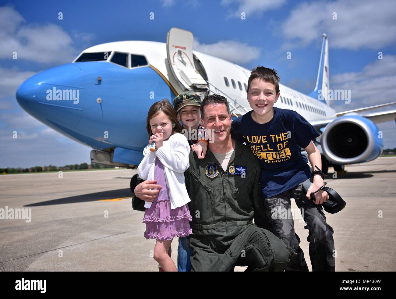 Lt. Col. Ralph "Louie" DePalma poses with his children after being ...