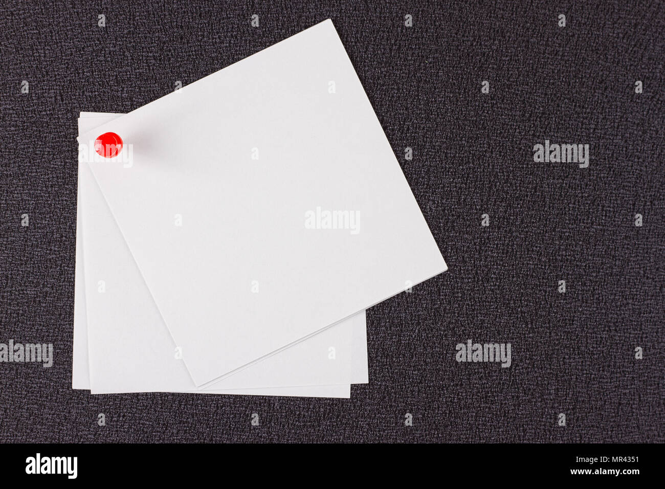 Note paper with red pin, on black. Clipping path included Stock Photo ...
