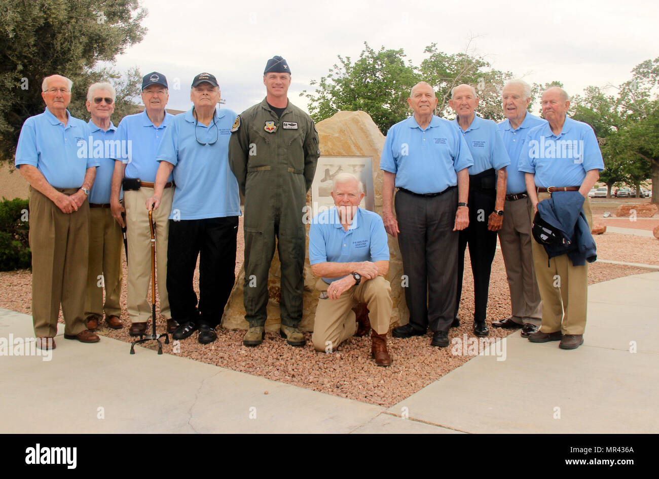 Members of the F-86 Sabre Association pose for a photo with Col ...