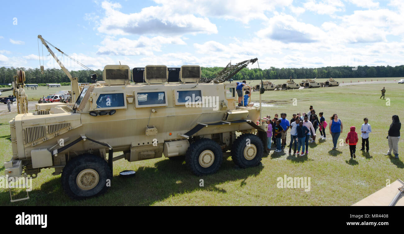 Attendees tour a Buffalo Mine Protected Route Clearance Vehicle during ...