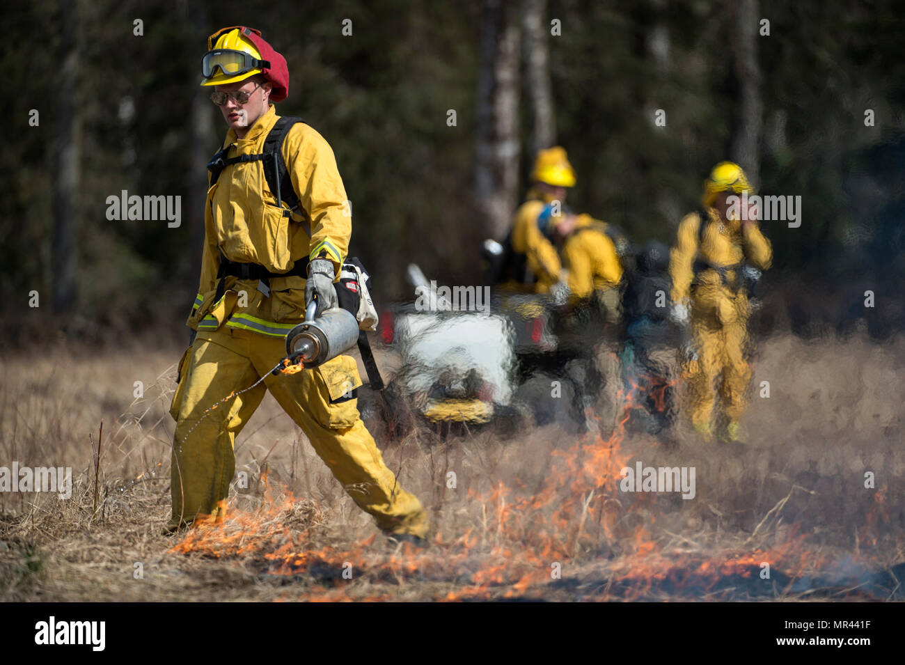 Firefighter drip torch hi-res stock photography and images - Alamy