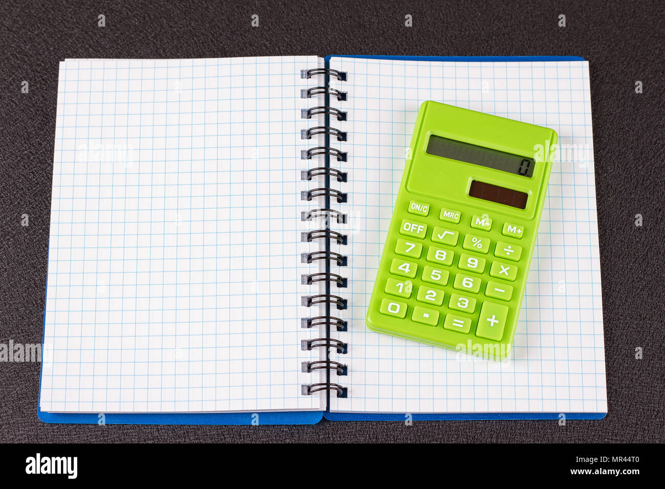Office calculator book note pad pen hi-res stock photography and images ...