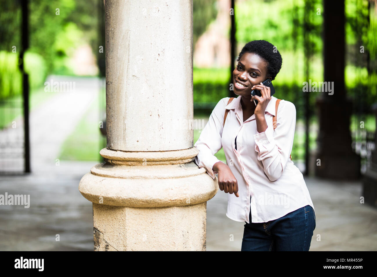 beautiful african american college student making a phone call Stock ...